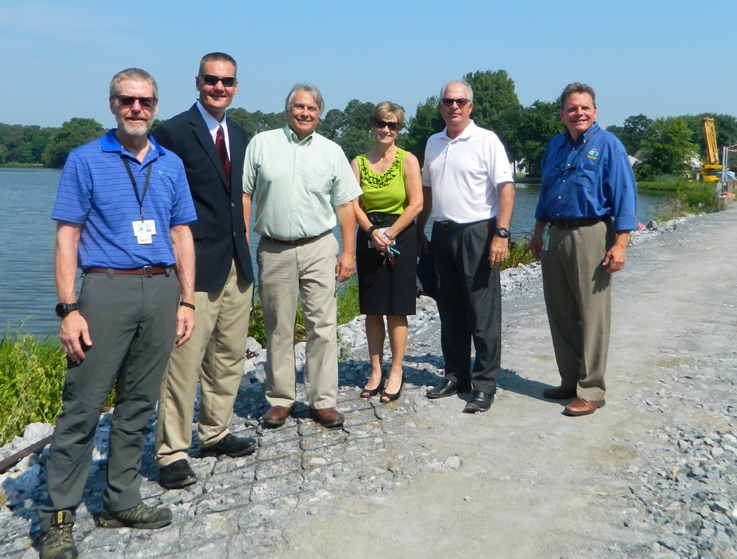 At Hearns Pond Dam near Seaford as reconstruction begins were, left to ...