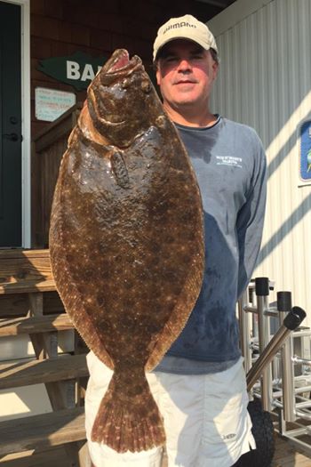 Joe Walker and his 26 3/4 inch, 7.39 pound flounder .. photo from Dave ...