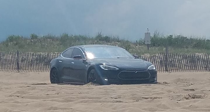 Tesla stuck on the beach in CHSP Saturday afternoon. - delaware-surf ...