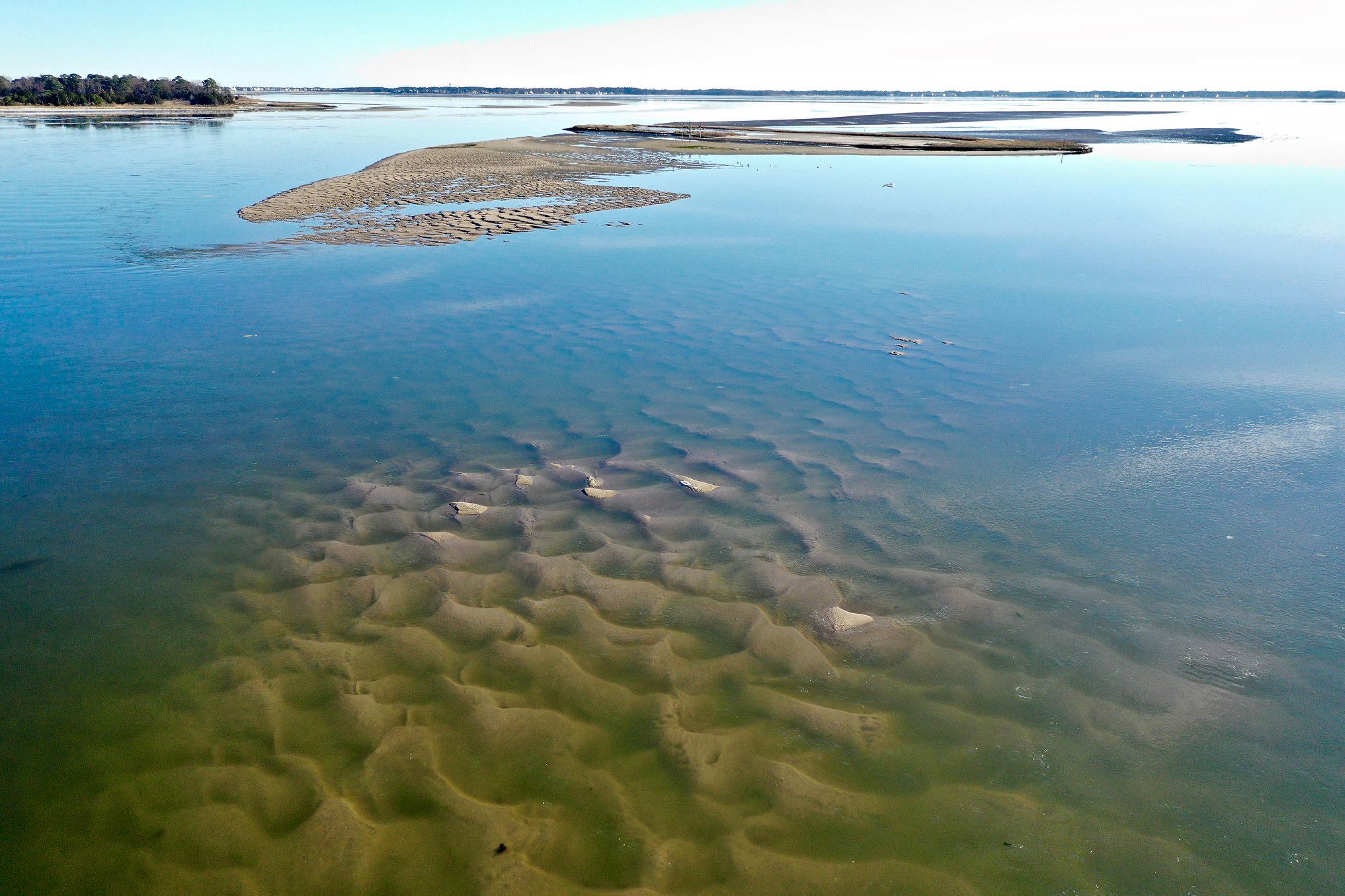 sand bar close up under water at dead low tide, you can see just how ...