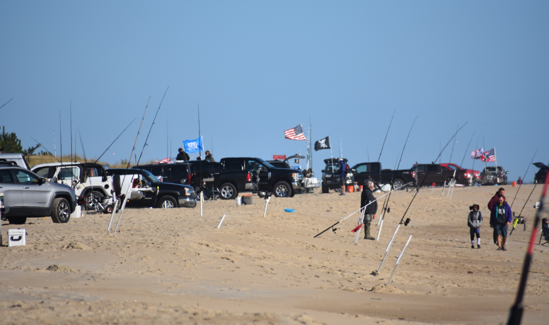 Surf anglers fishing rough conditions on Herring Point to Gordons pond ...